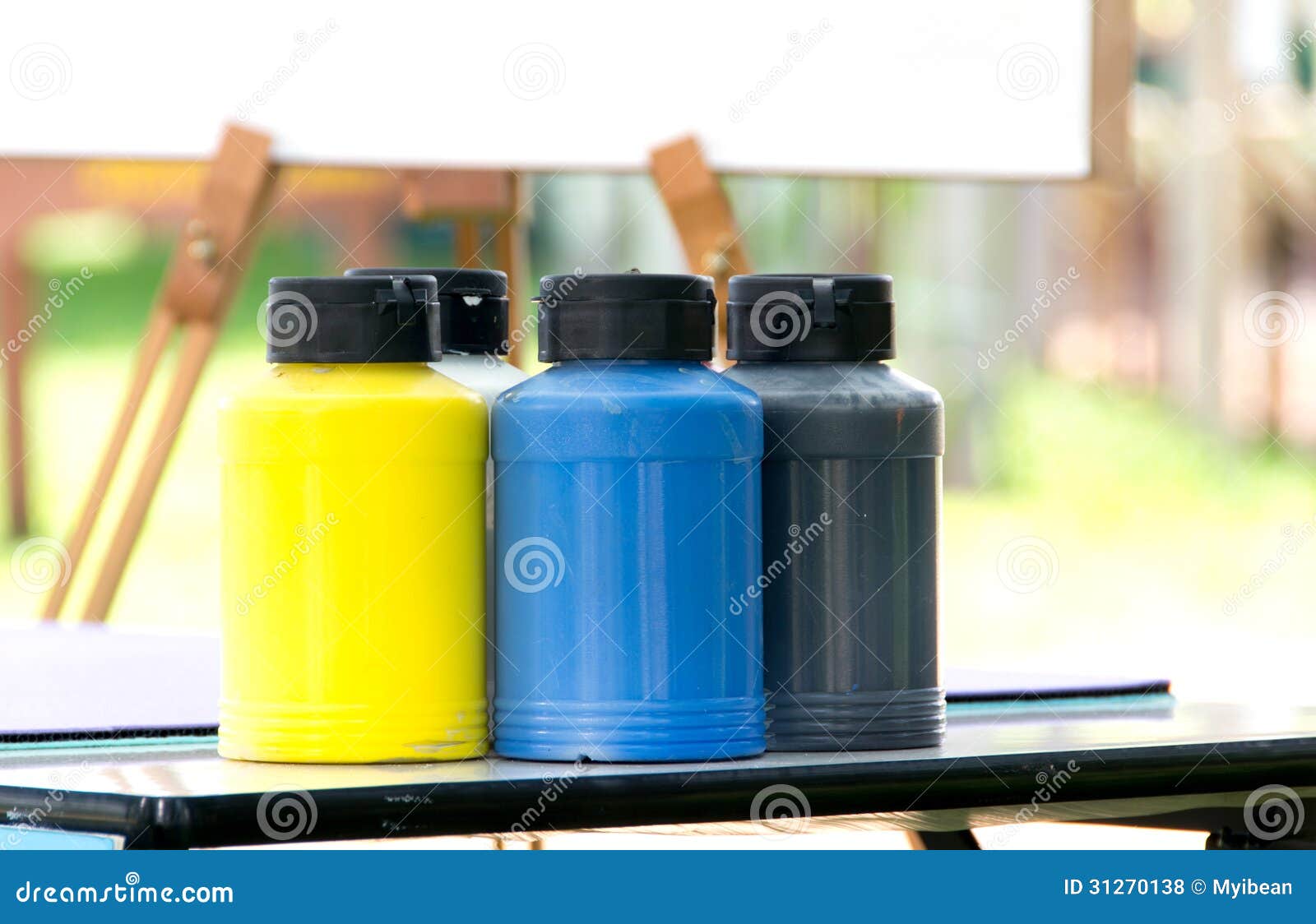 Color bottles of a paint stock photo. Image of round - 31270138