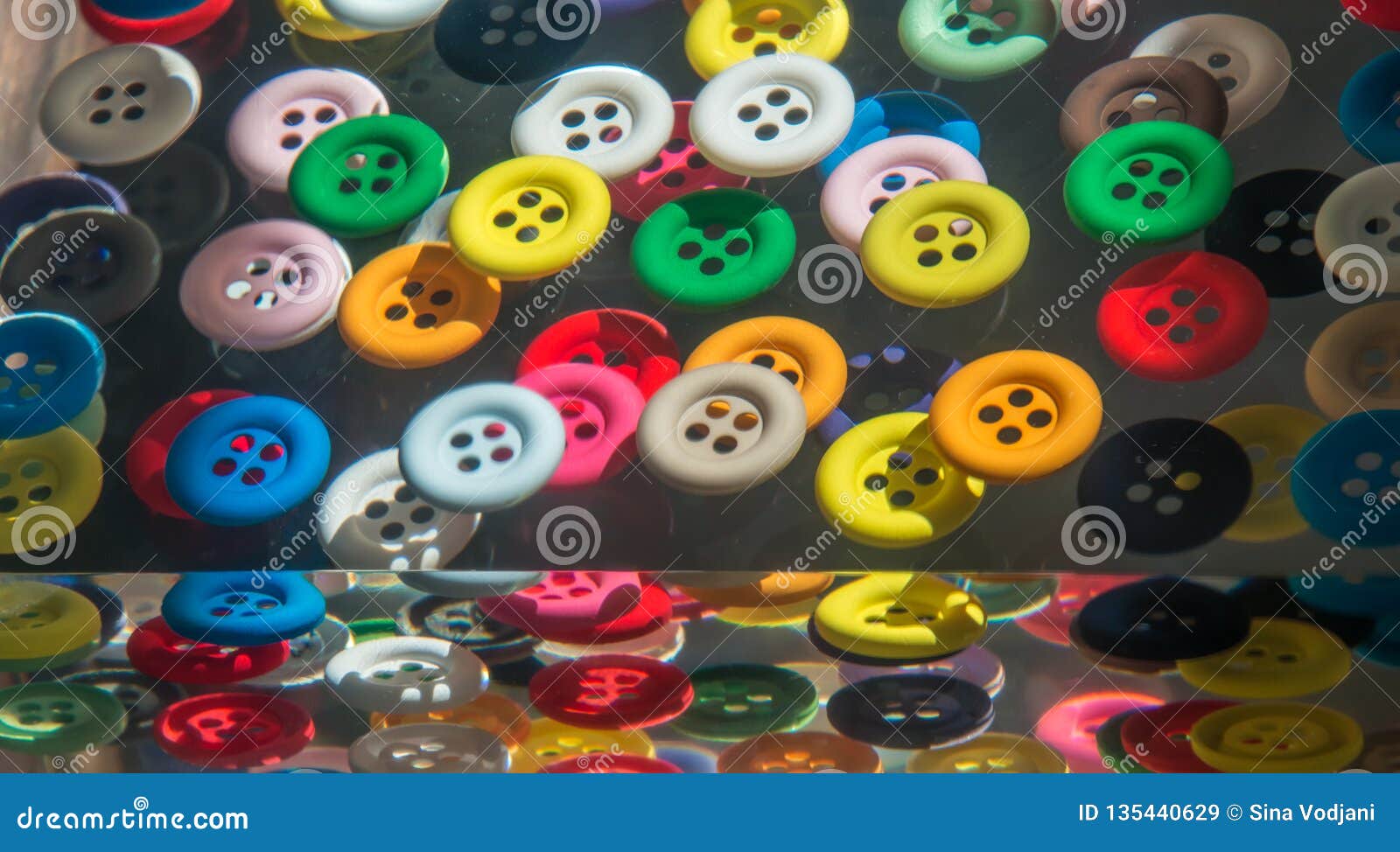 Color Buttons Captured in Resin Stock Image - Image of dress, artwork ...