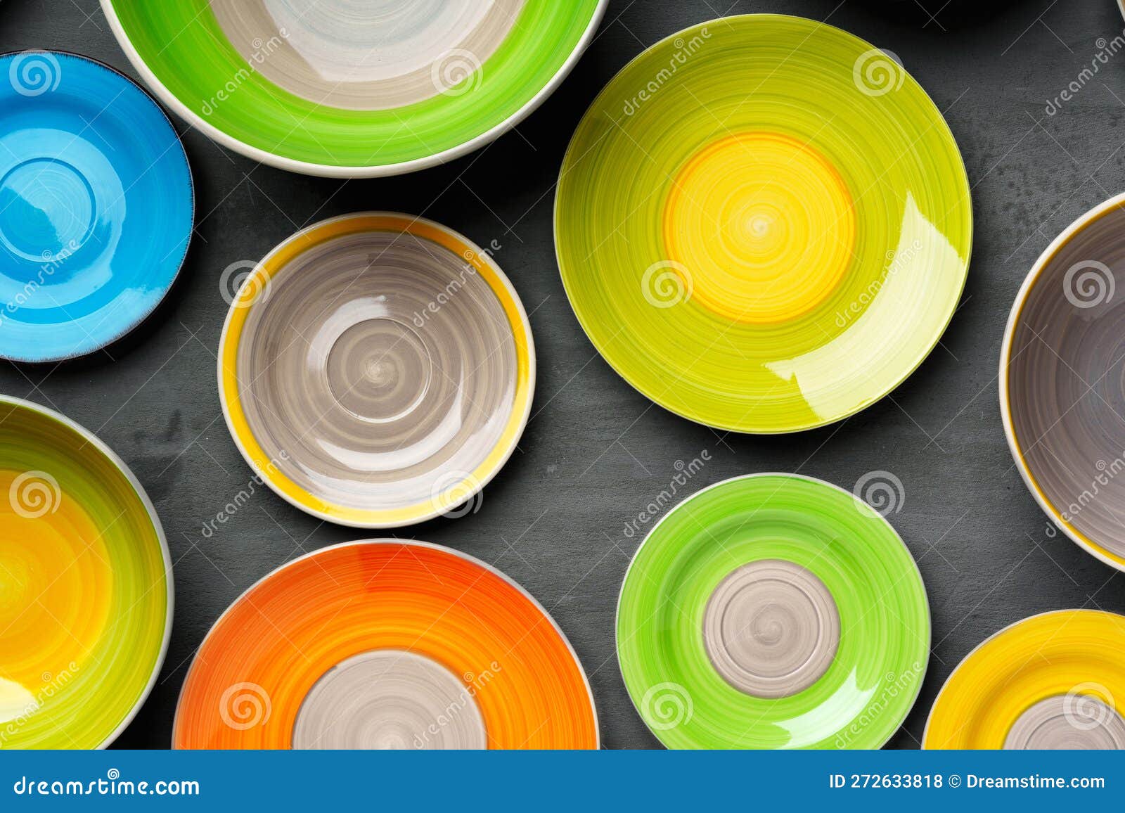 Color Ceramic Plates on Gray Background Top View Photo Stock Photo ...