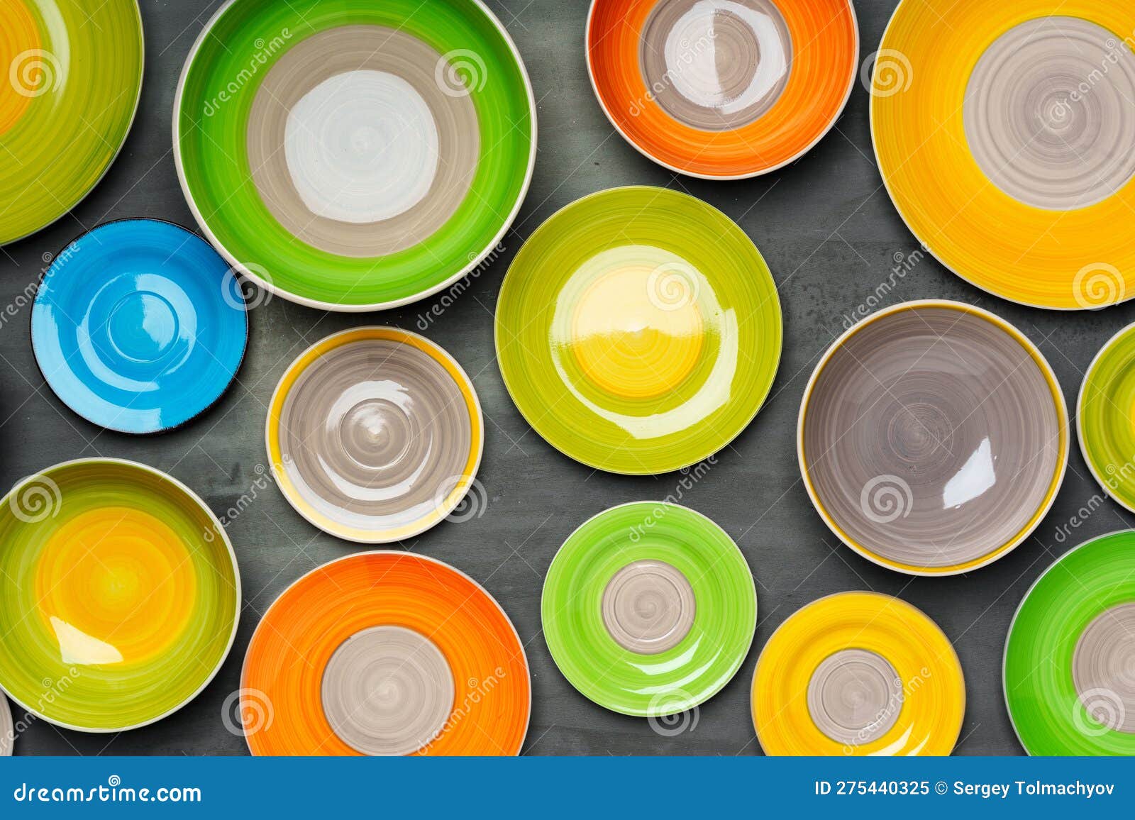 Color Ceramic Plates on Gray Background Top View Photo Stock Image ...