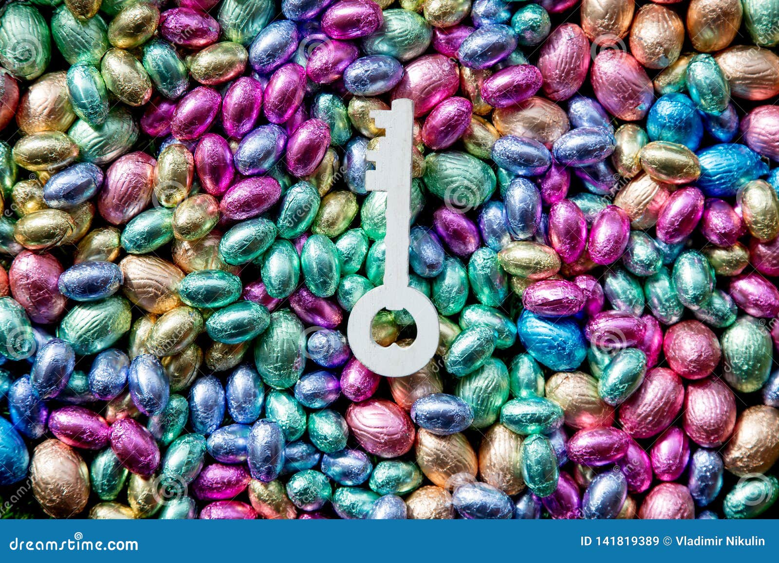 Color Chocolate Easter Eggs and Key on it Stock Image - Image of rustic ...
