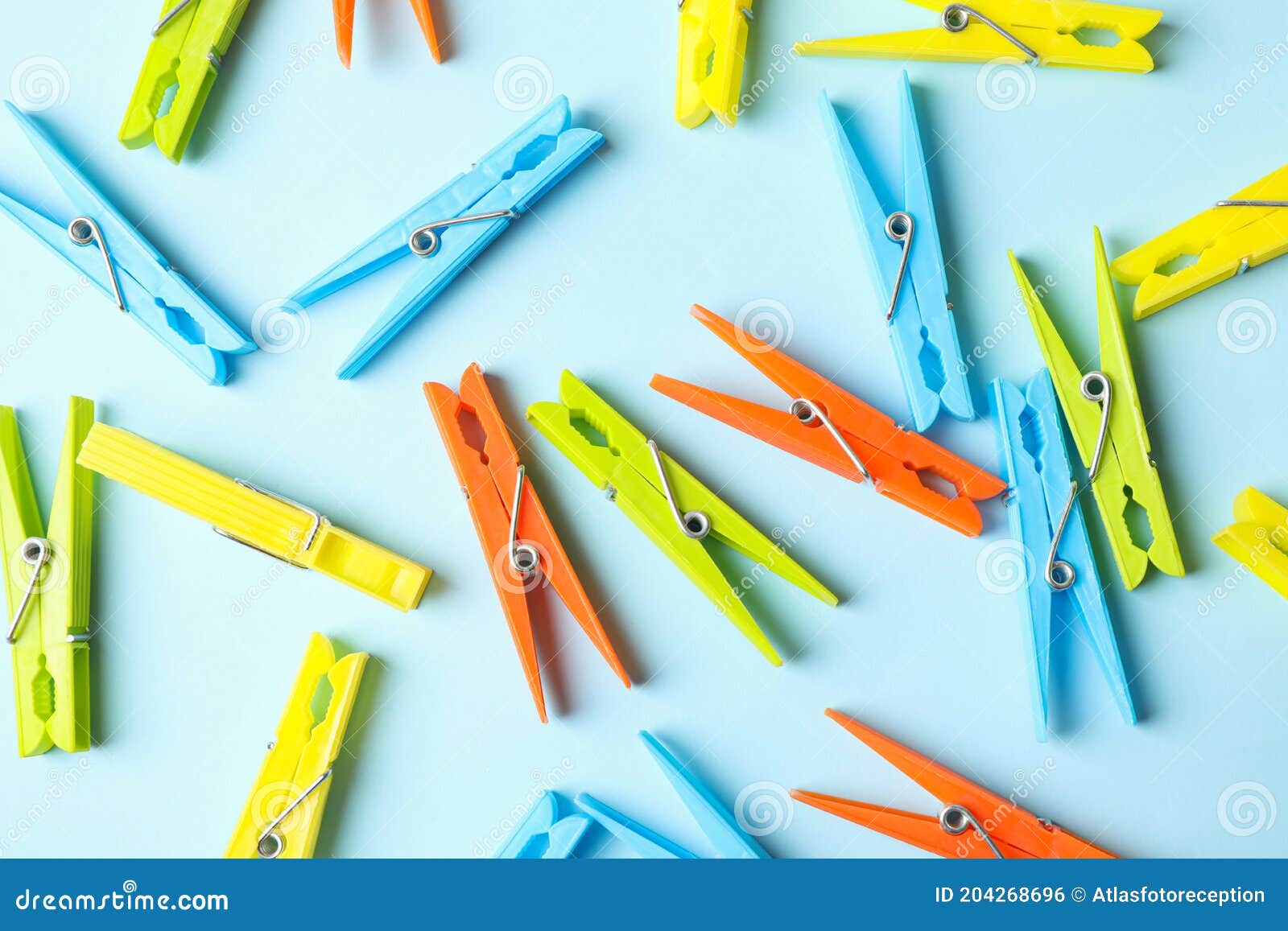 Color Clothespins on Blue Background, Top View Stock Photo - Image of ...