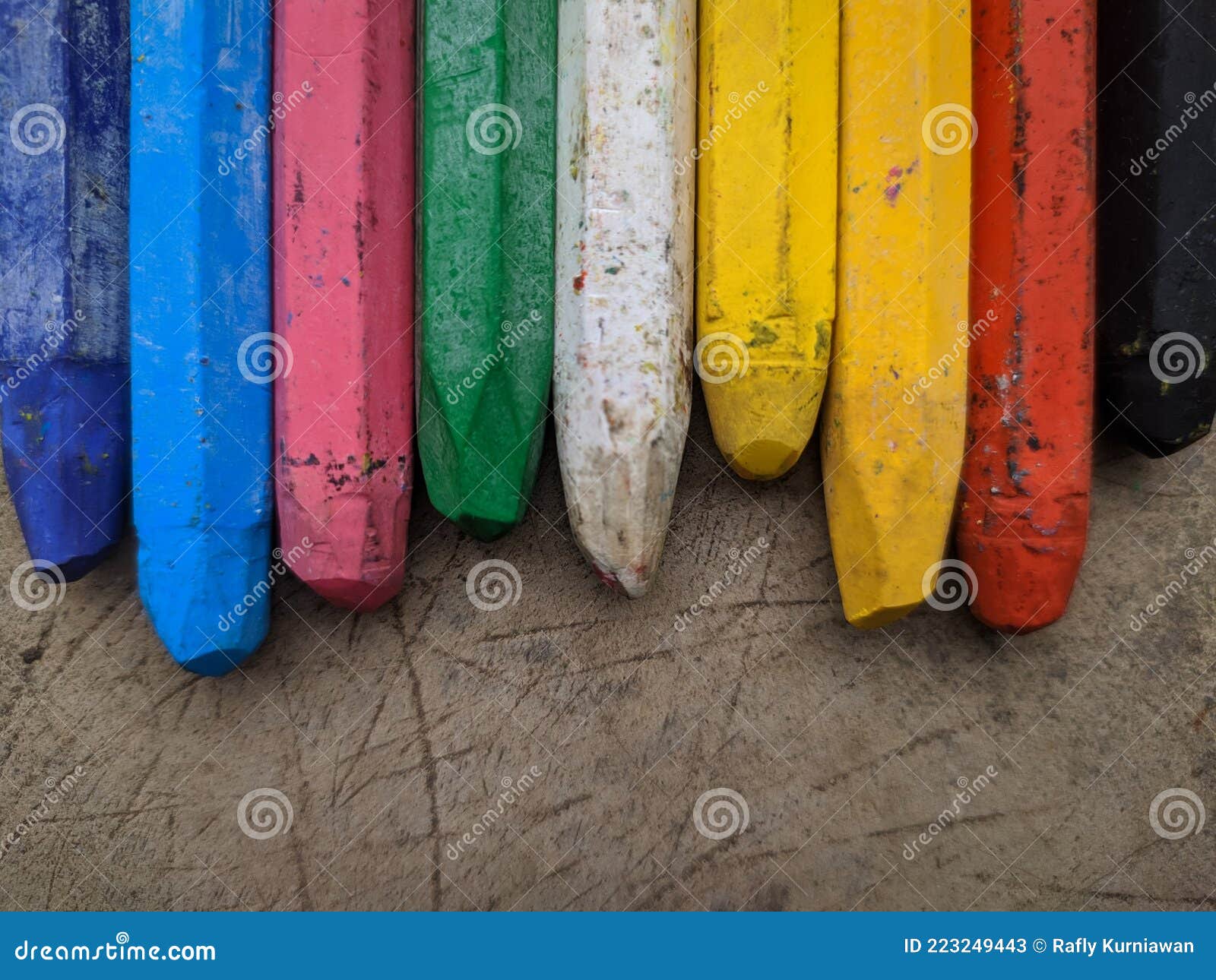 Color crayons on the floor stock image. Image of floor - 223249443