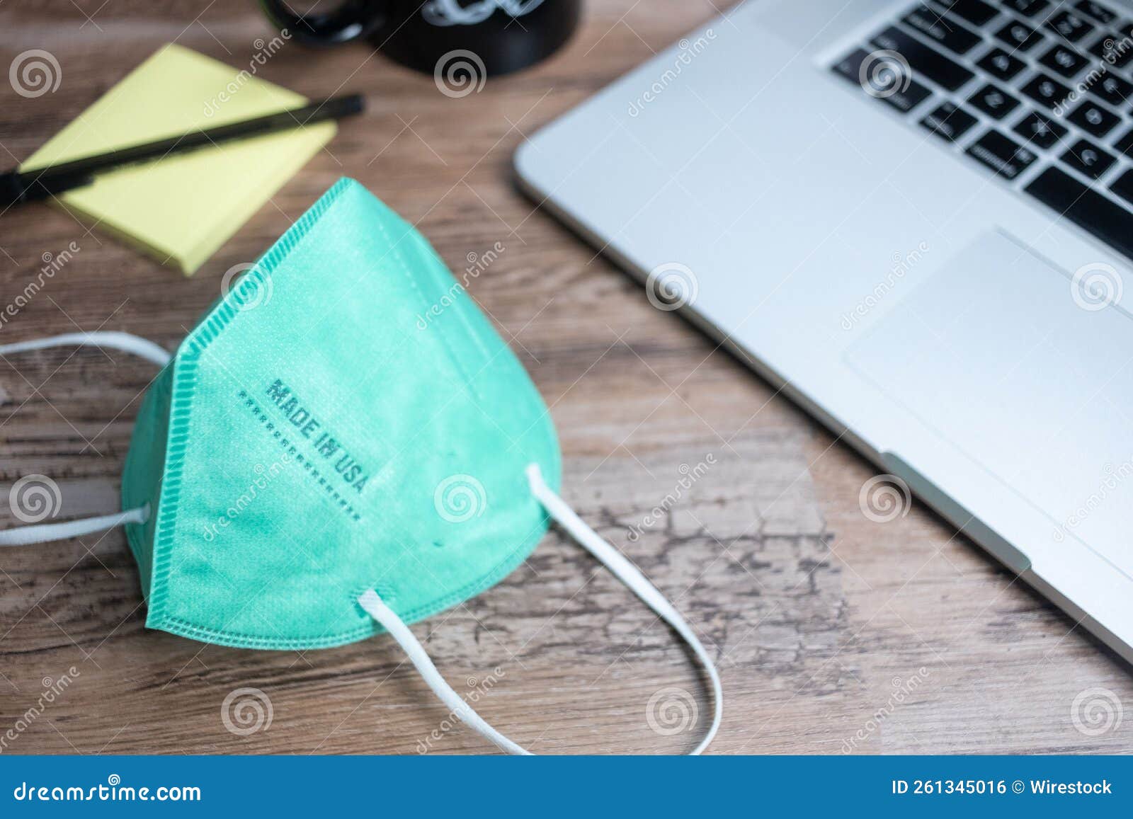 Color Facemasks on a Desktop with Office Elements Stock Photo - Image ...