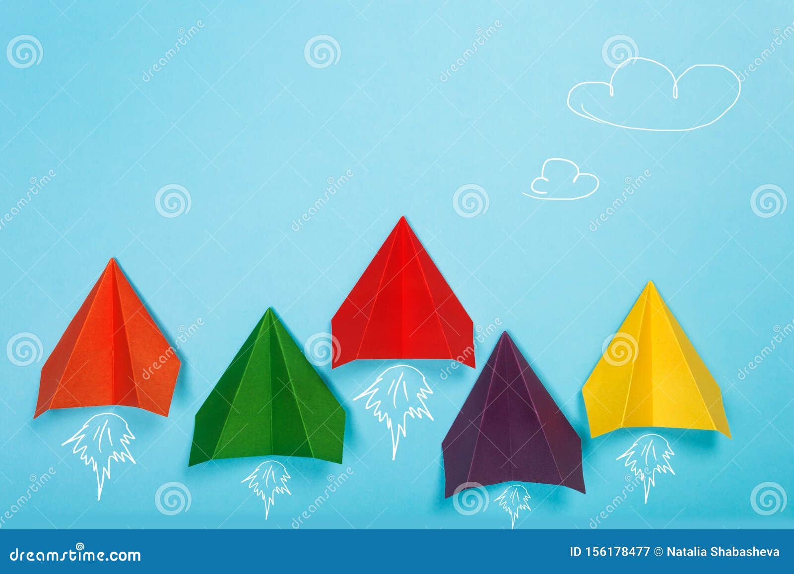 Color Paper Airplanes on Blue Background. Different Vision Creative and ...