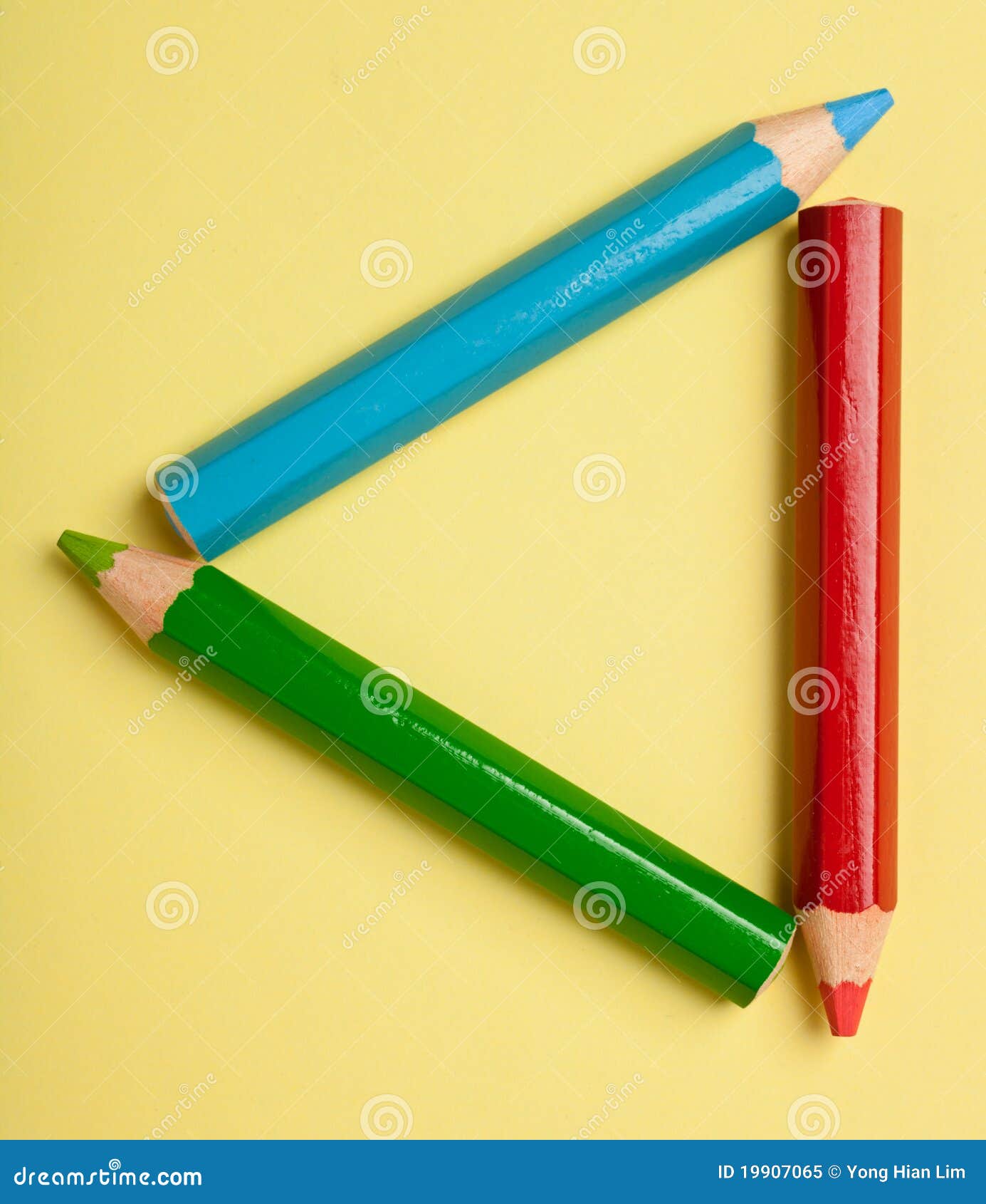Color Pencils Forming a Triangle Frame Stock Image - Image of ...