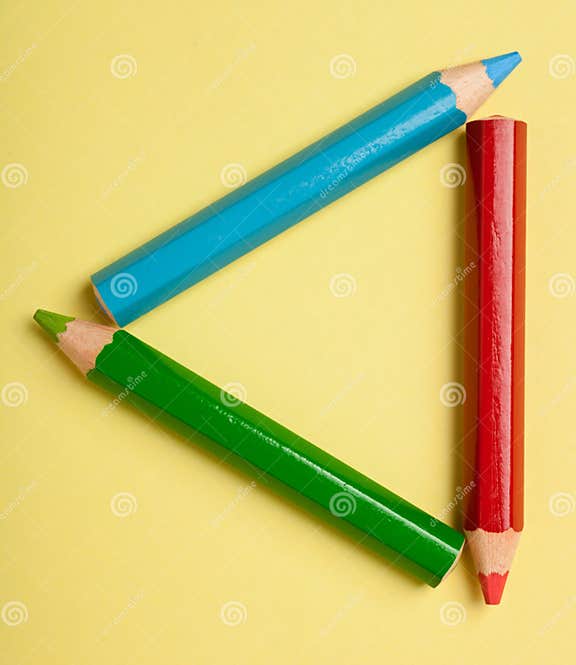 Color Pencils Forming a Triangle Frame Stock Image - Image of ...