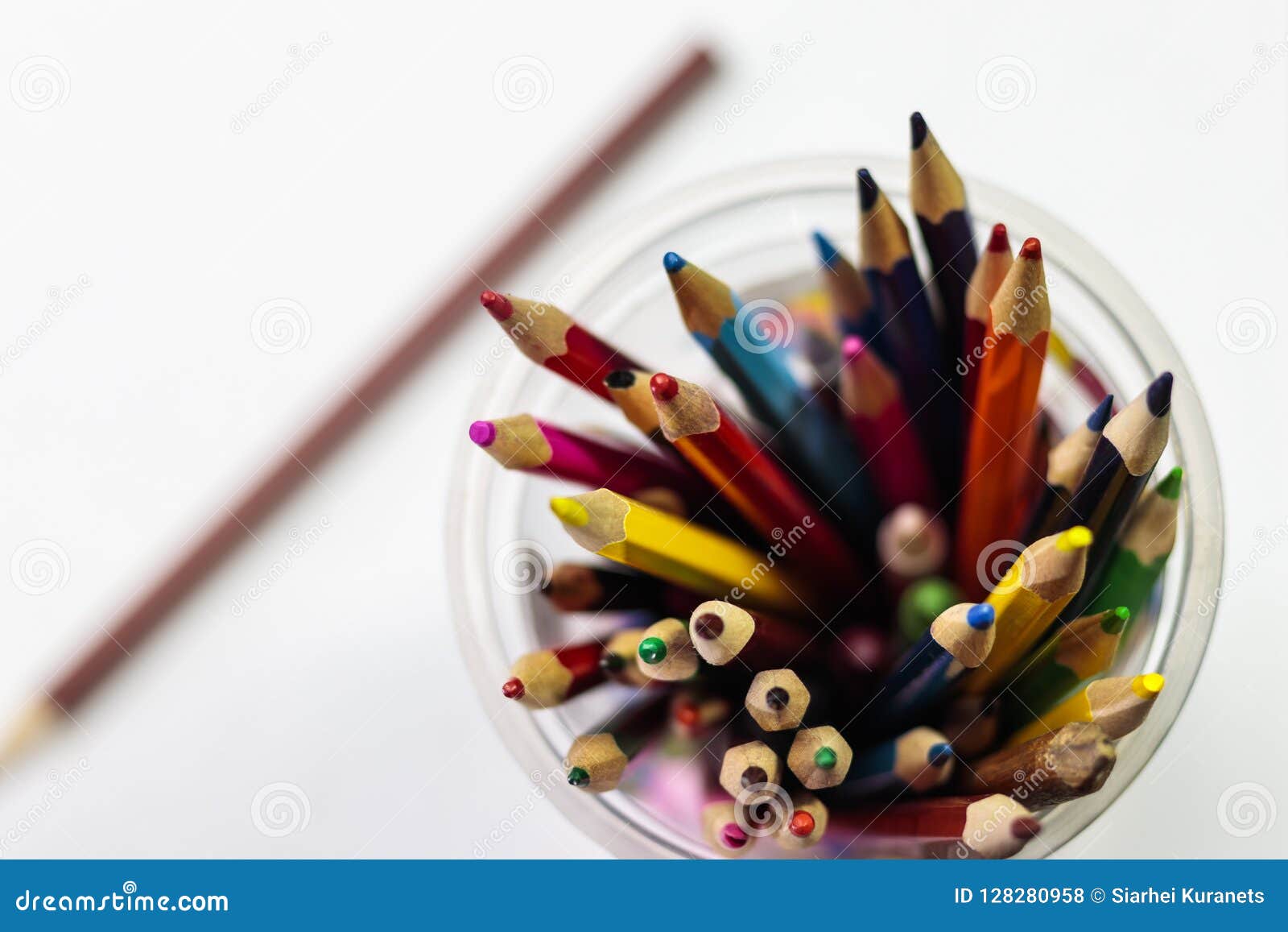 Color Pencils in a Glass on a Sheet of White Paper Stock Photo - Image ...