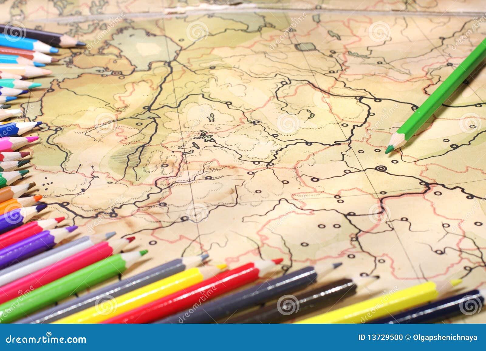 Color pencils on old map stock photo. Image of close - 13729500