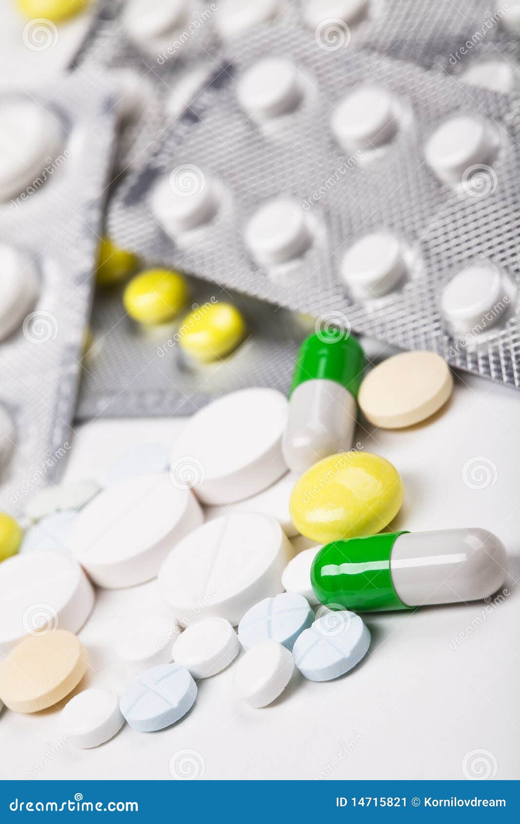 Color Pills and Capsuls Against Tablet`s Packs Stock Image - Image of ...