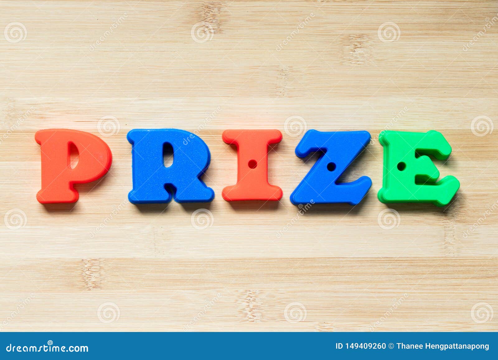 Color Alphabet in Word Prize on Wood Background Stock Photo - Image of ...