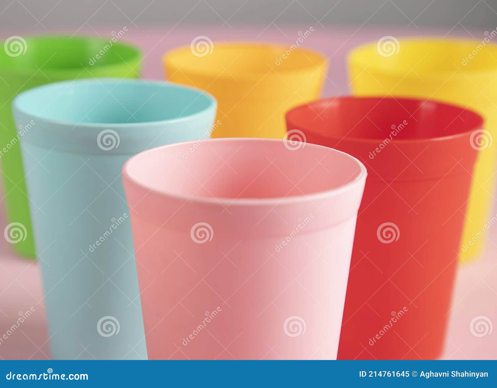 Color Plastic Cups on Pink Background Stock Image - Image of empty ...