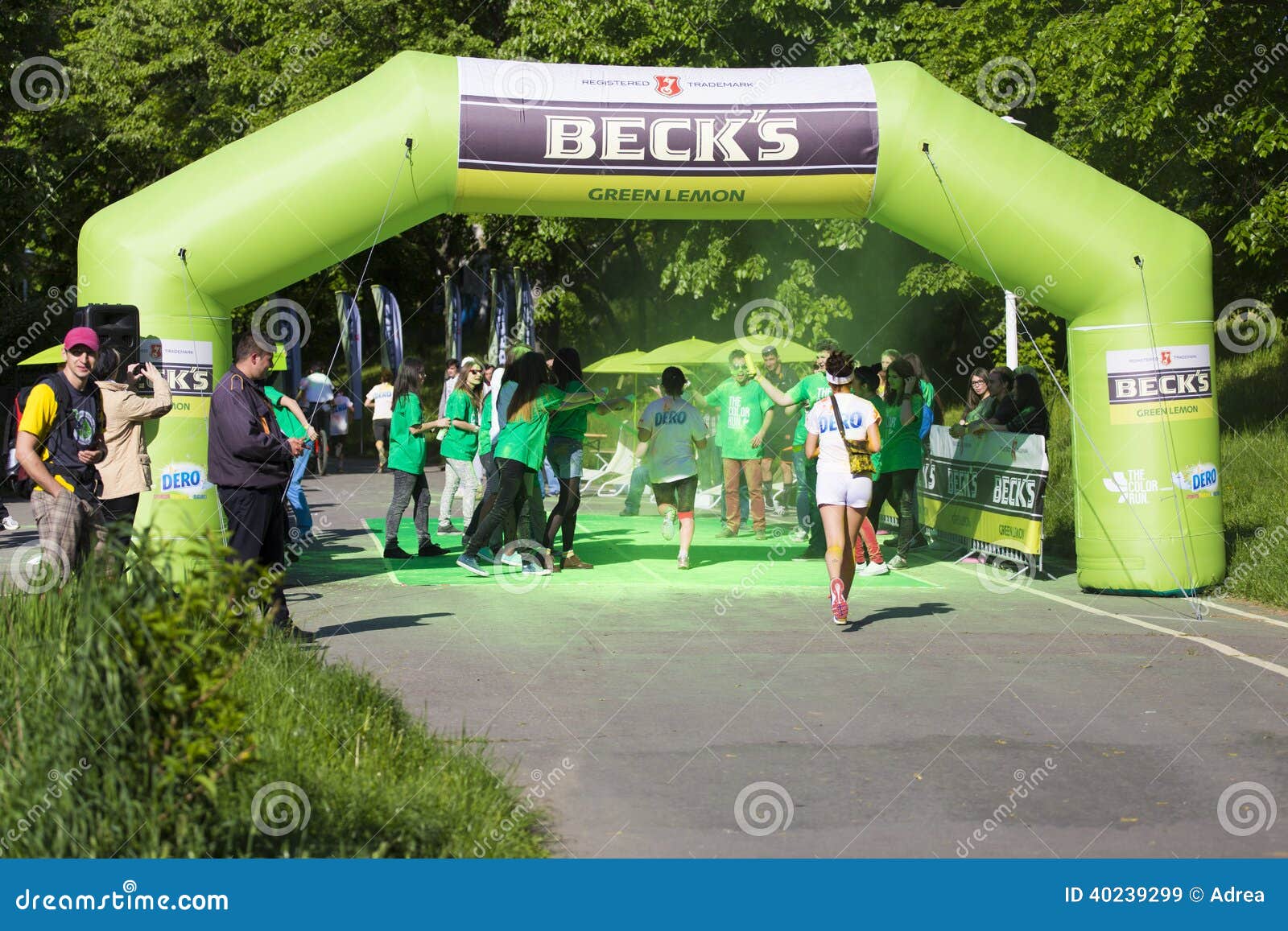 Runner Passing Under the Green Gate Editorial Stock Image - Image of ...