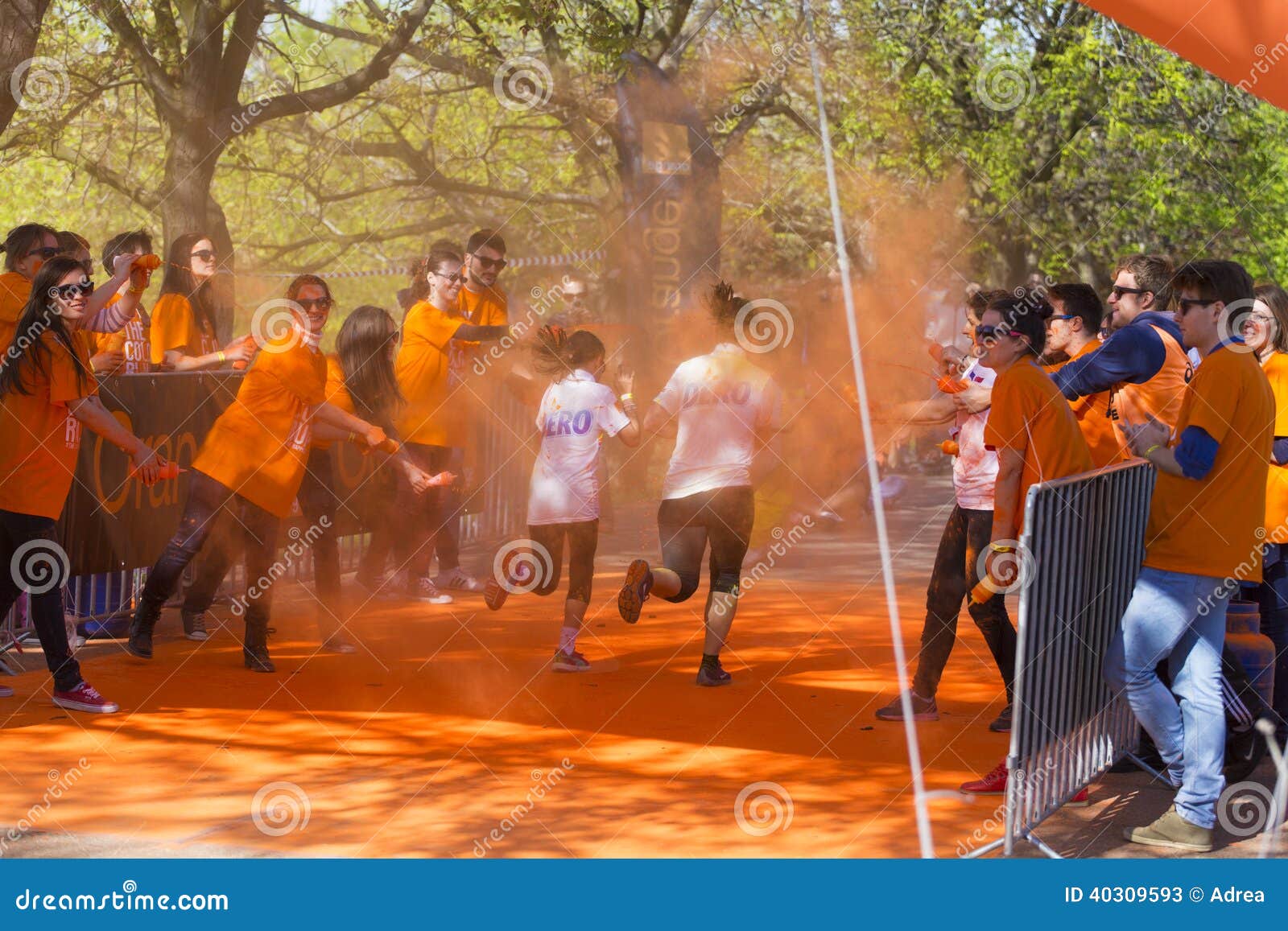 Runner Passing Under the Orange Gate Editorial Stock Photo - Image of ...