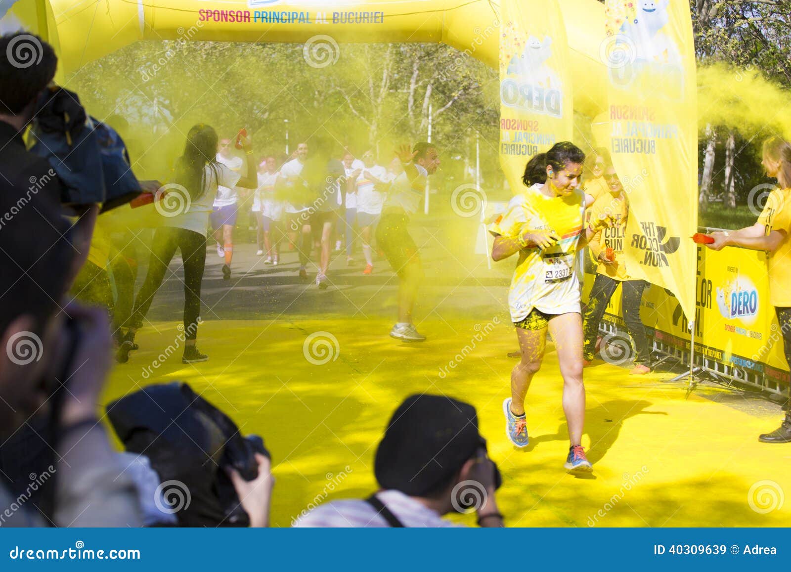 Runner Passing Under the Yellow Gate Editorial Stock Image - Image of ...