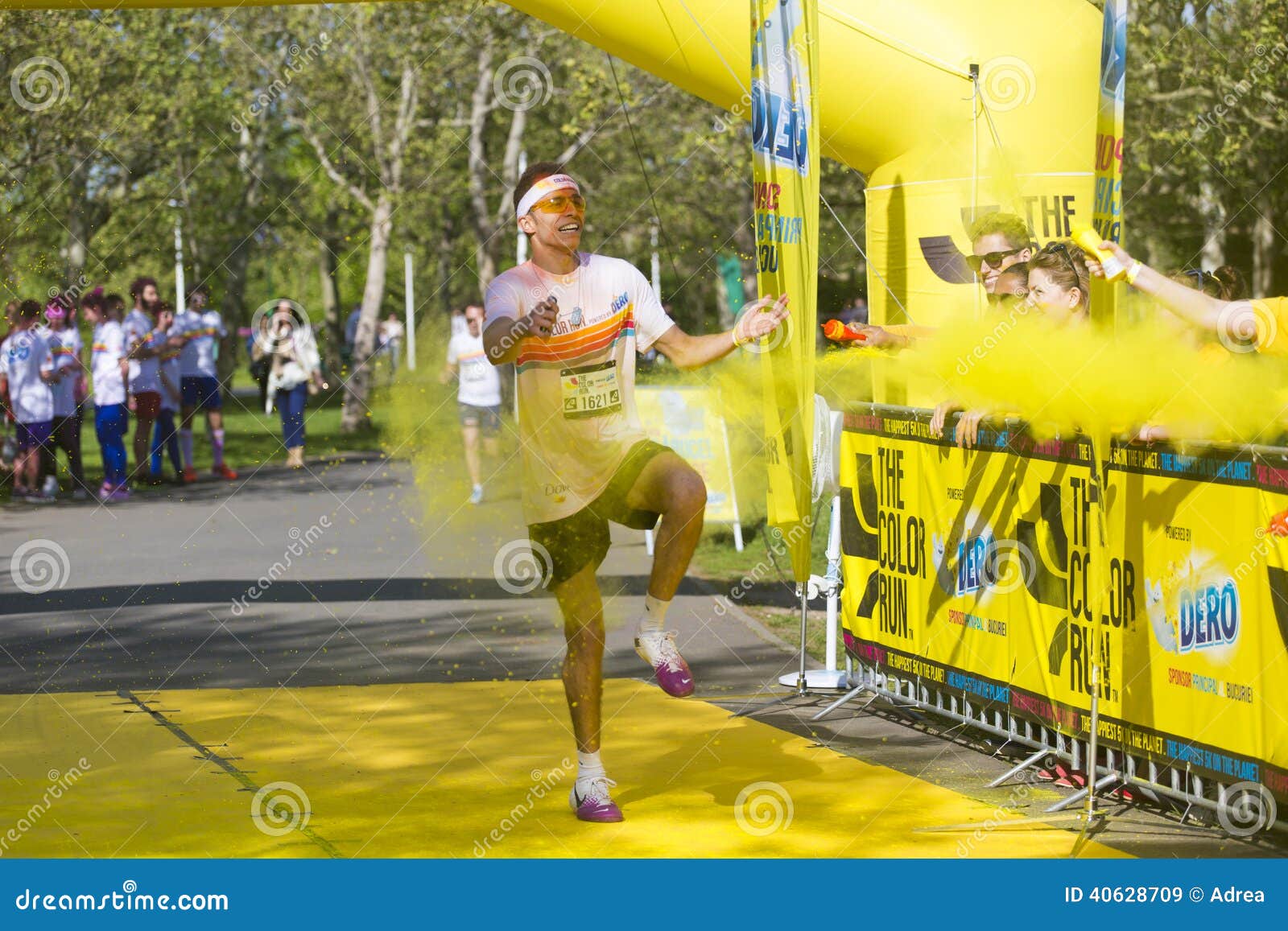 Runner Passing Under the Yellow Gate Editorial Stock Image - Image of ...