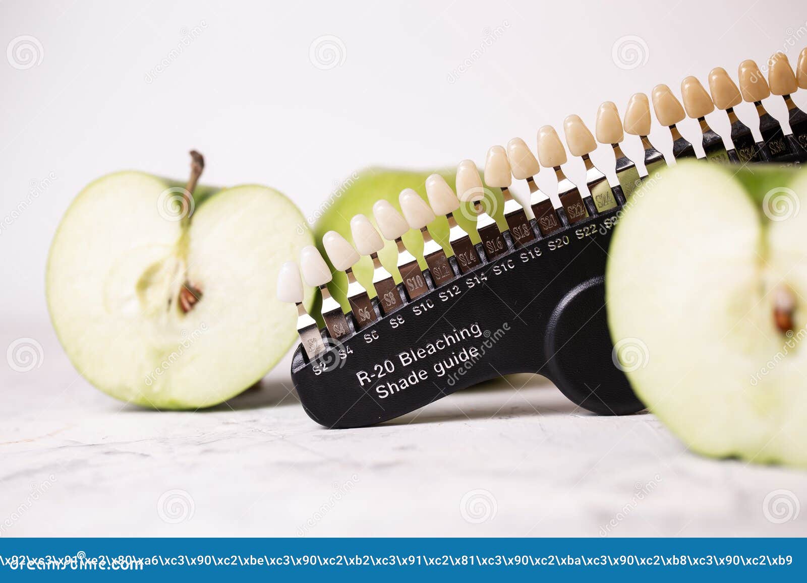 Color Scale of Teeth Cosmetic Dentistry. Scale and Green Apples Stock ...