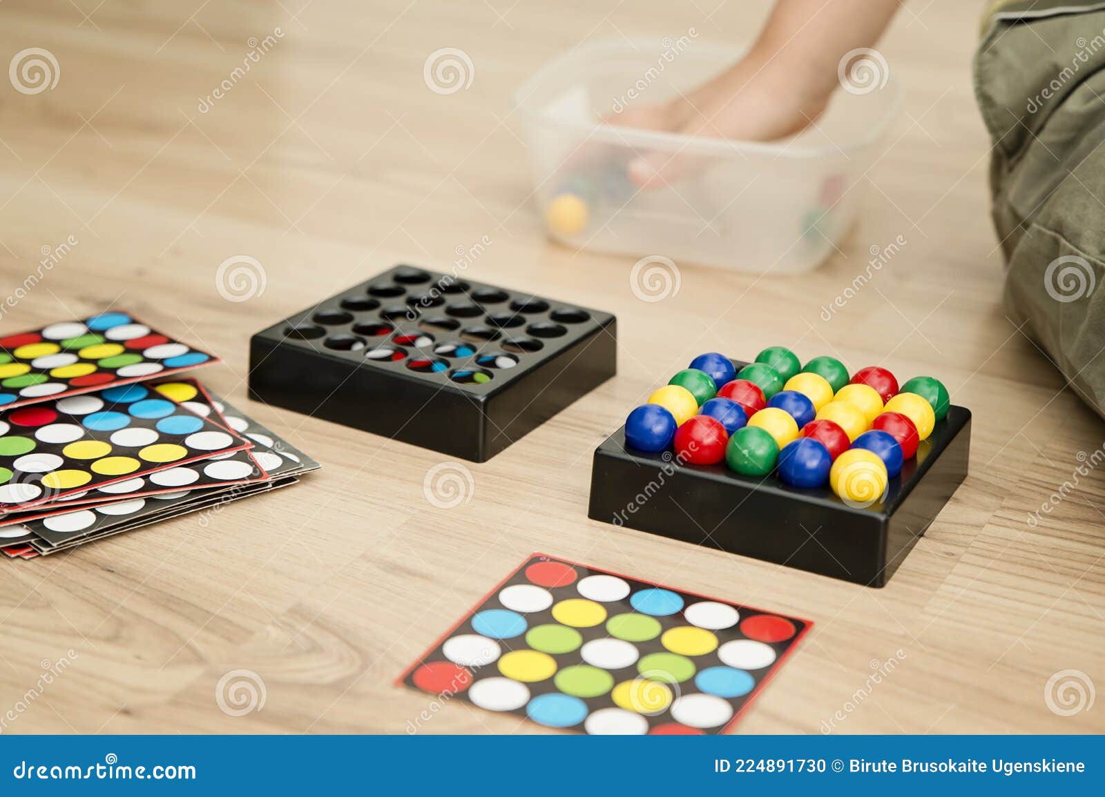 Childs Hand on Colorful Wooden Marbles. Stock Photo - Image of motor ...