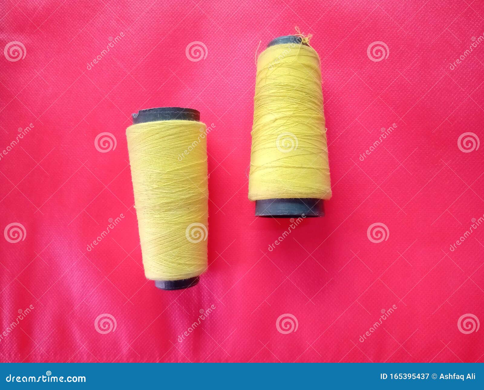 Color Sewing Threads, Stitching Threads on Non Woven Fabric Background ...