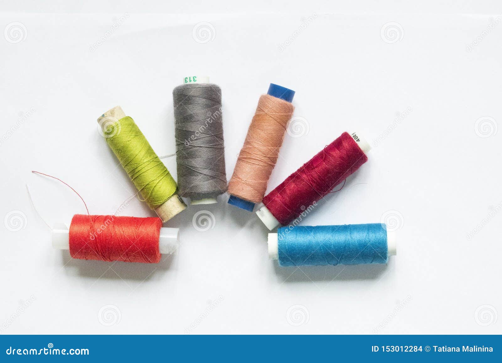 Color Sewing Threads on White Background Stock Photo - Image of ...