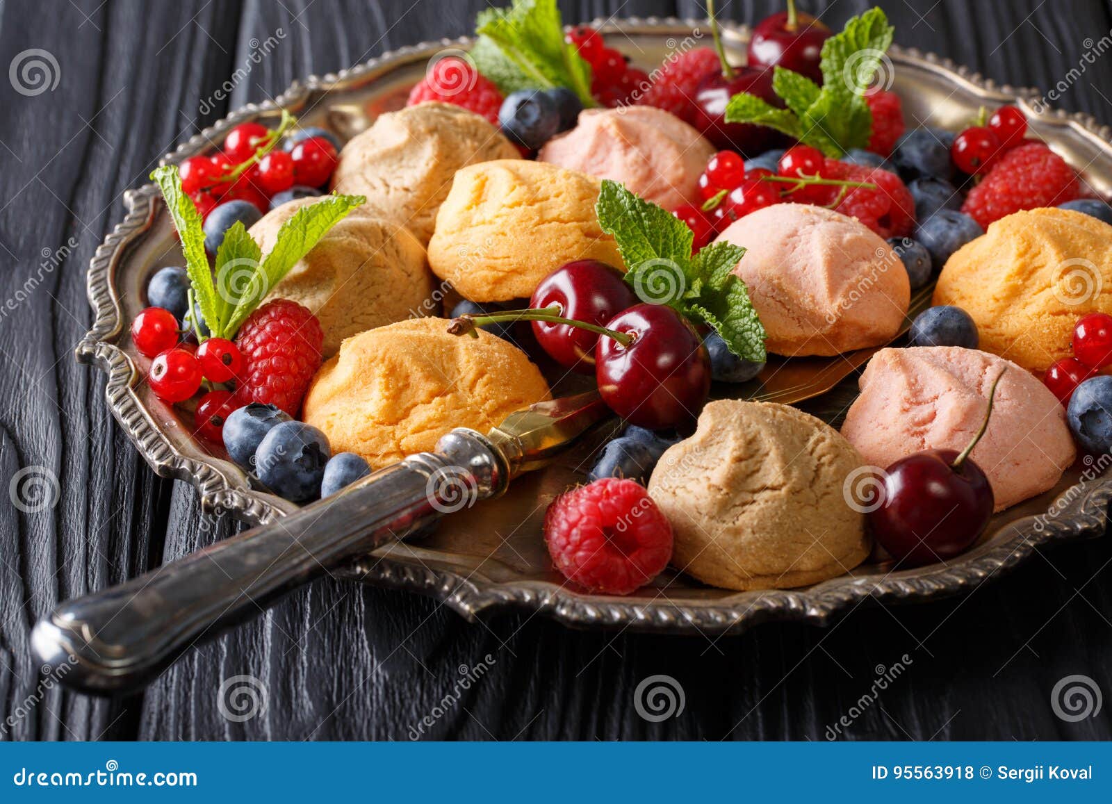Color Shortbread Biscuit with Fresh Berries and Mint Close-up. H Stock ...
