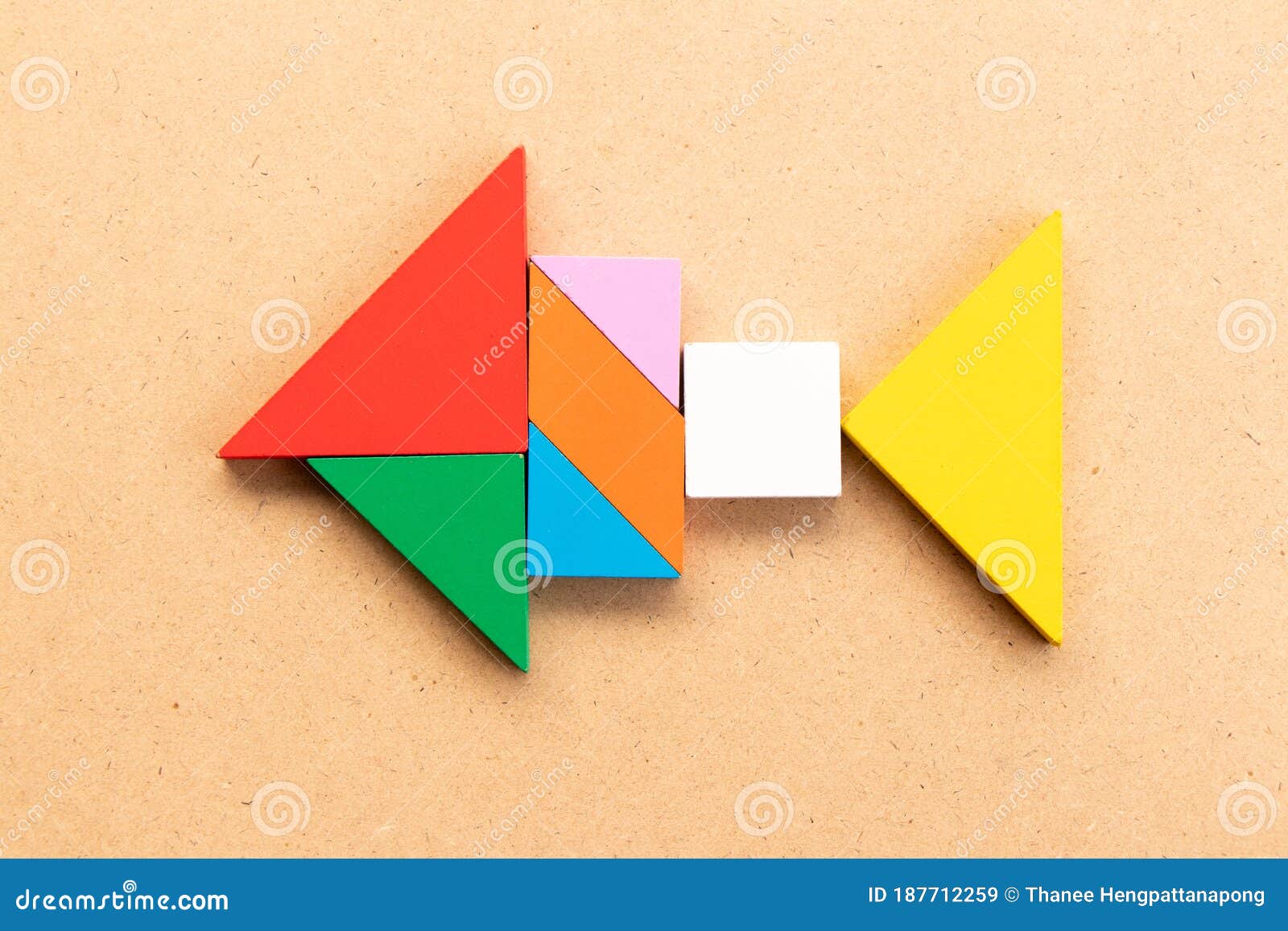 Color Tangram In House Or Home Shape On Wood Background Stock Photo ...