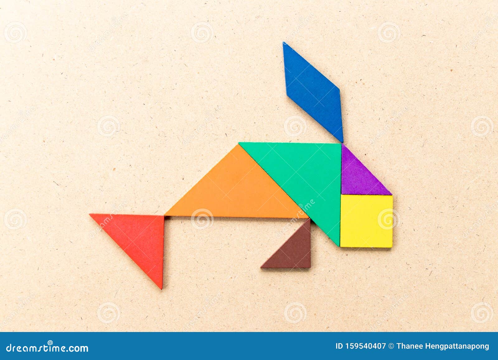 Color Tangram In Fish Shape On Wood Background Royalty-Free Stock Photo ...