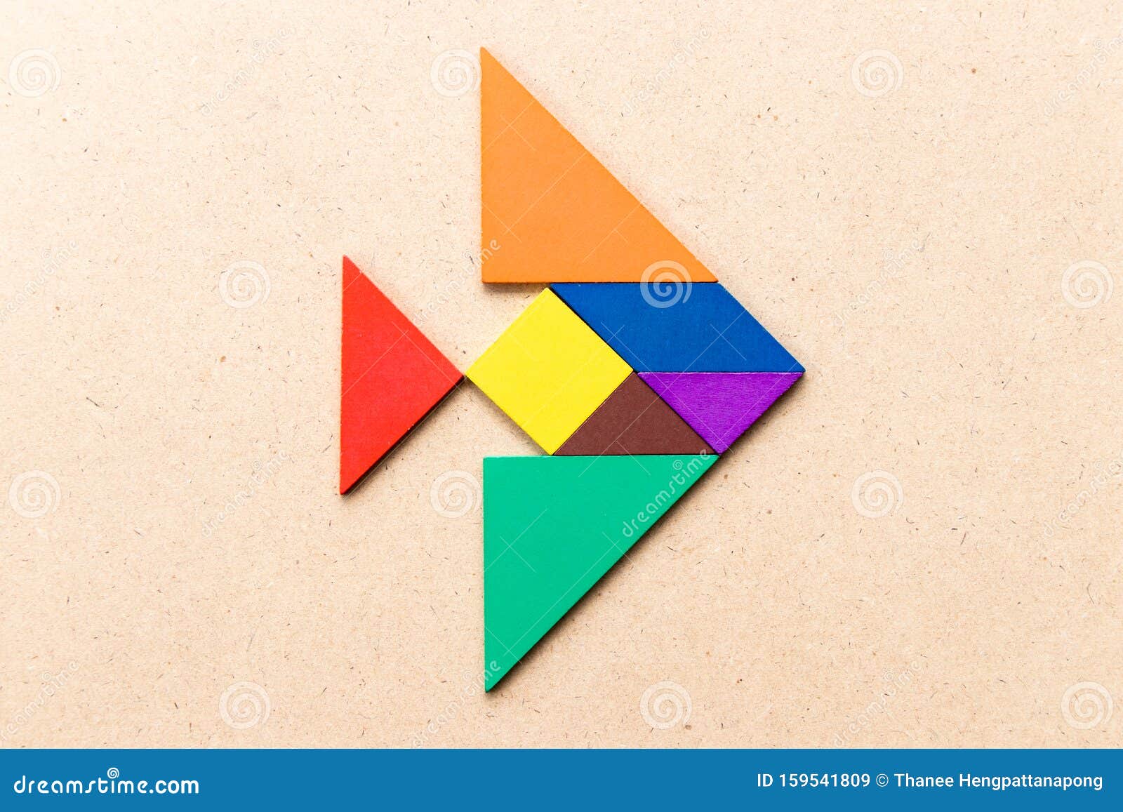 Color Tangram In Fish Shape On Wood Background Royalty-Free Stock Photo ...