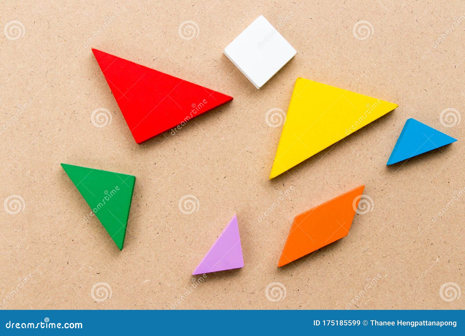 Color Tangram In Sword Shape On Wood Background Royalty-Free Stock ...