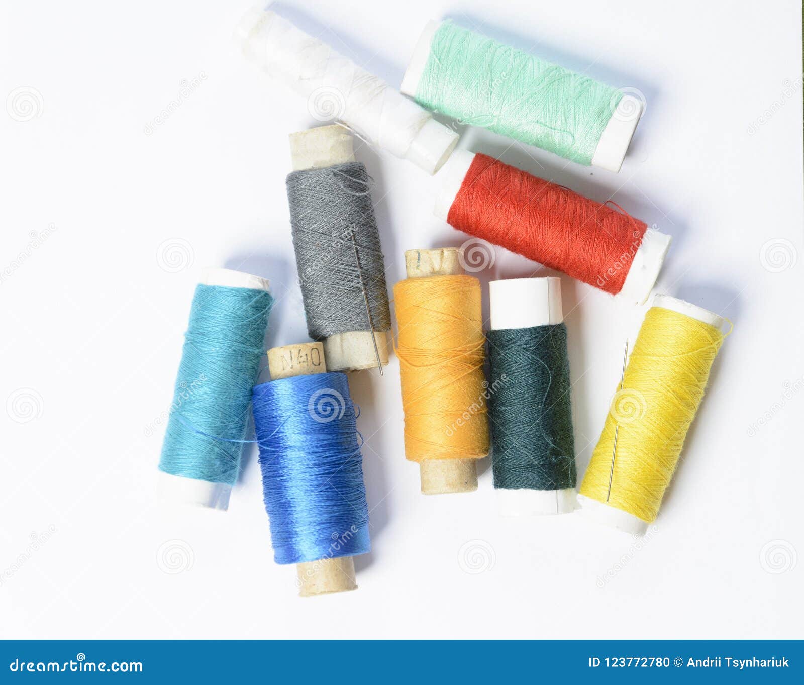 Color Threads for Sewing on a White Textured Background Stock Photo ...