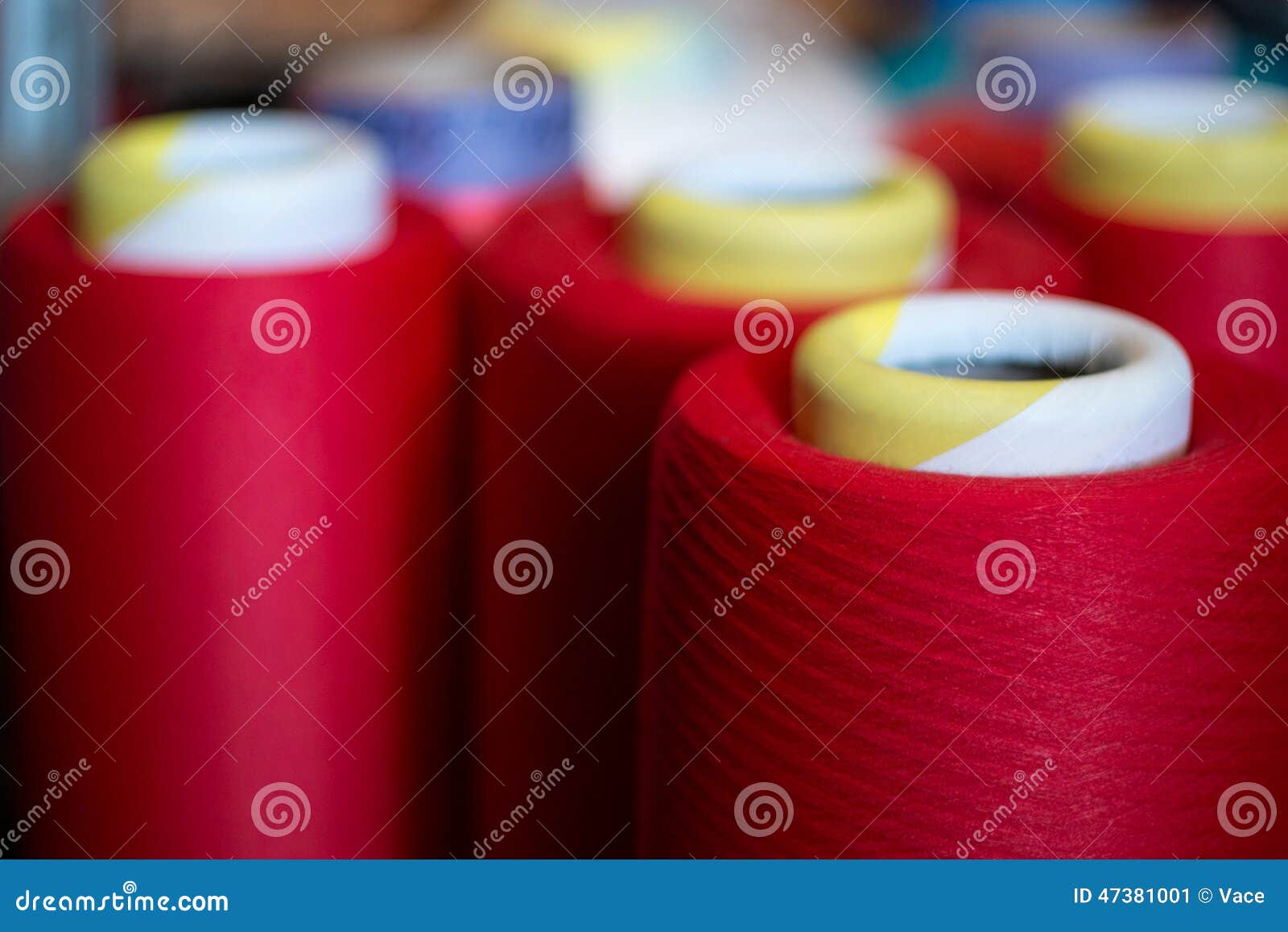 Color yarn cones closeup stock image. Image of abstract - 47381001