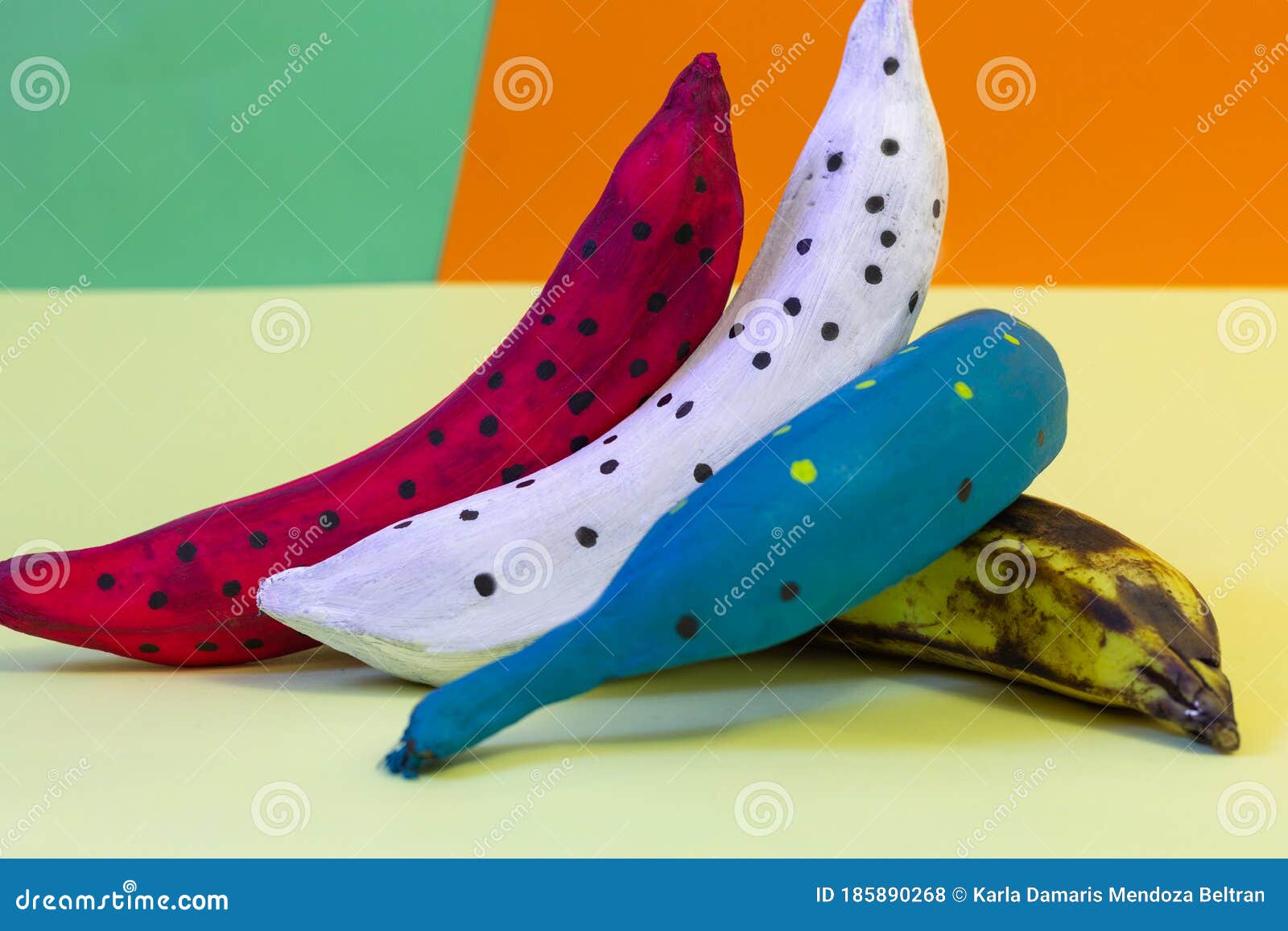 Colored Bananas on Orange, Blue Cardboard Stock Photo - Image of green ...