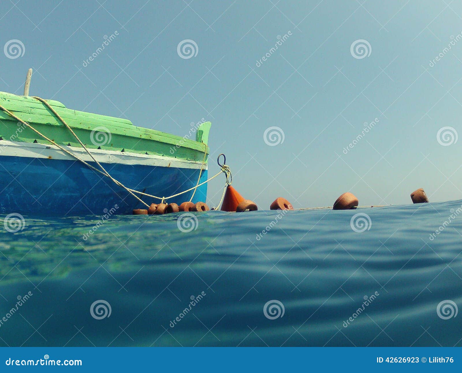 Colored boat stock image. Image of water, green, boat - 42626923