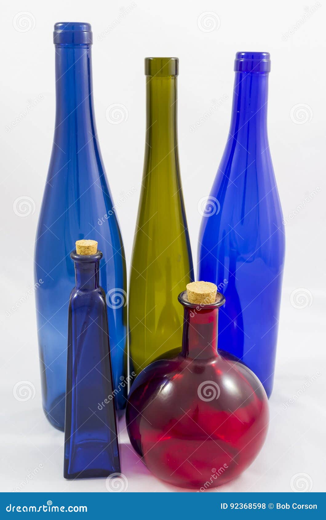 Colored bottles stock photo. Image of glass, three, pretty - 92368598
