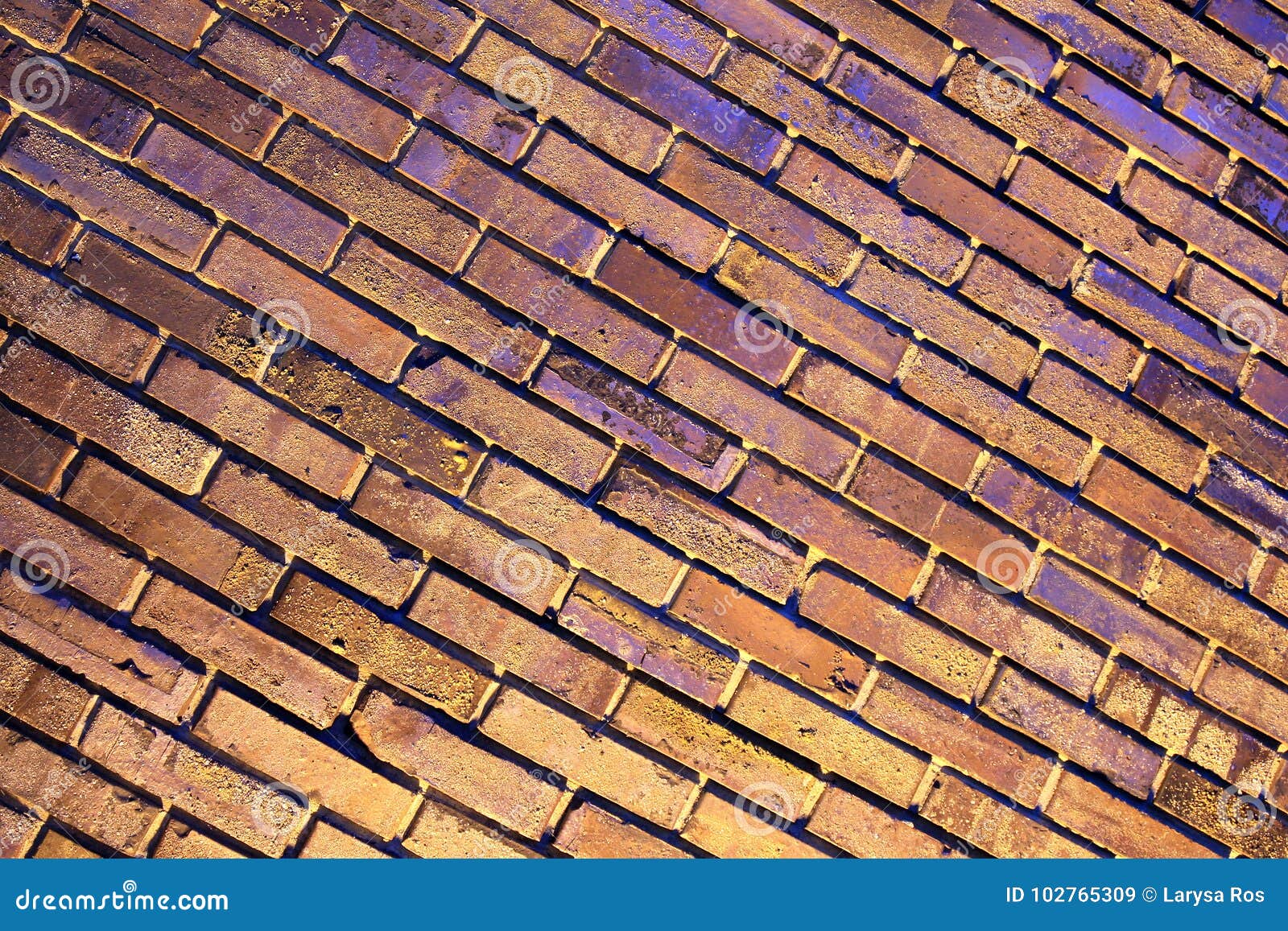Colored Brick Wall with Illumination at Night, Background, Diagonal ...