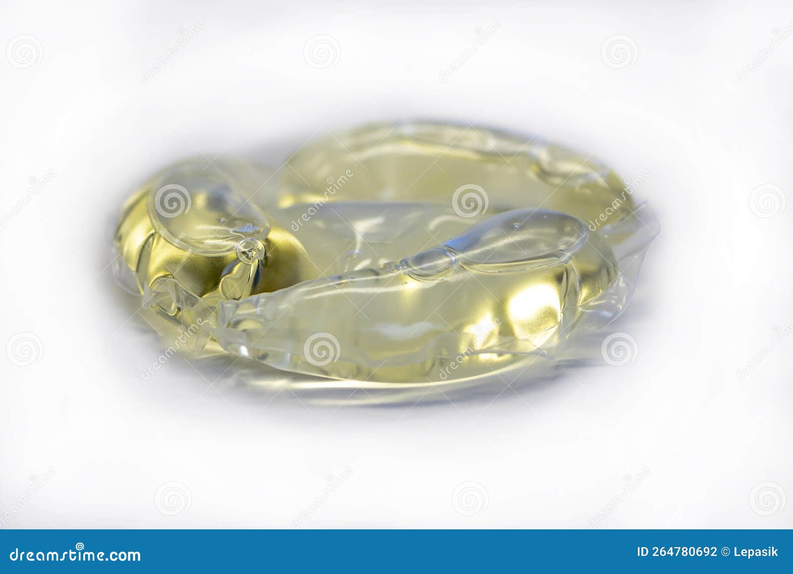 Colored Capsule for Washing Clothes on a Light Background, Close-up ...