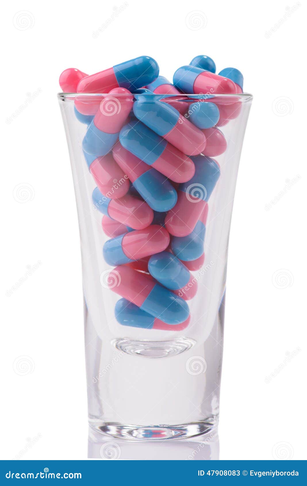 Colored Capsules in a Glass Isolated Stock Image - Image of happiness ...