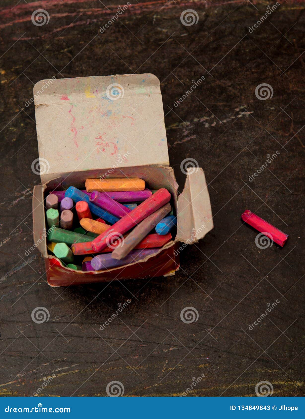 Colored chalks on box stock image. Image of blackboard - 134849843