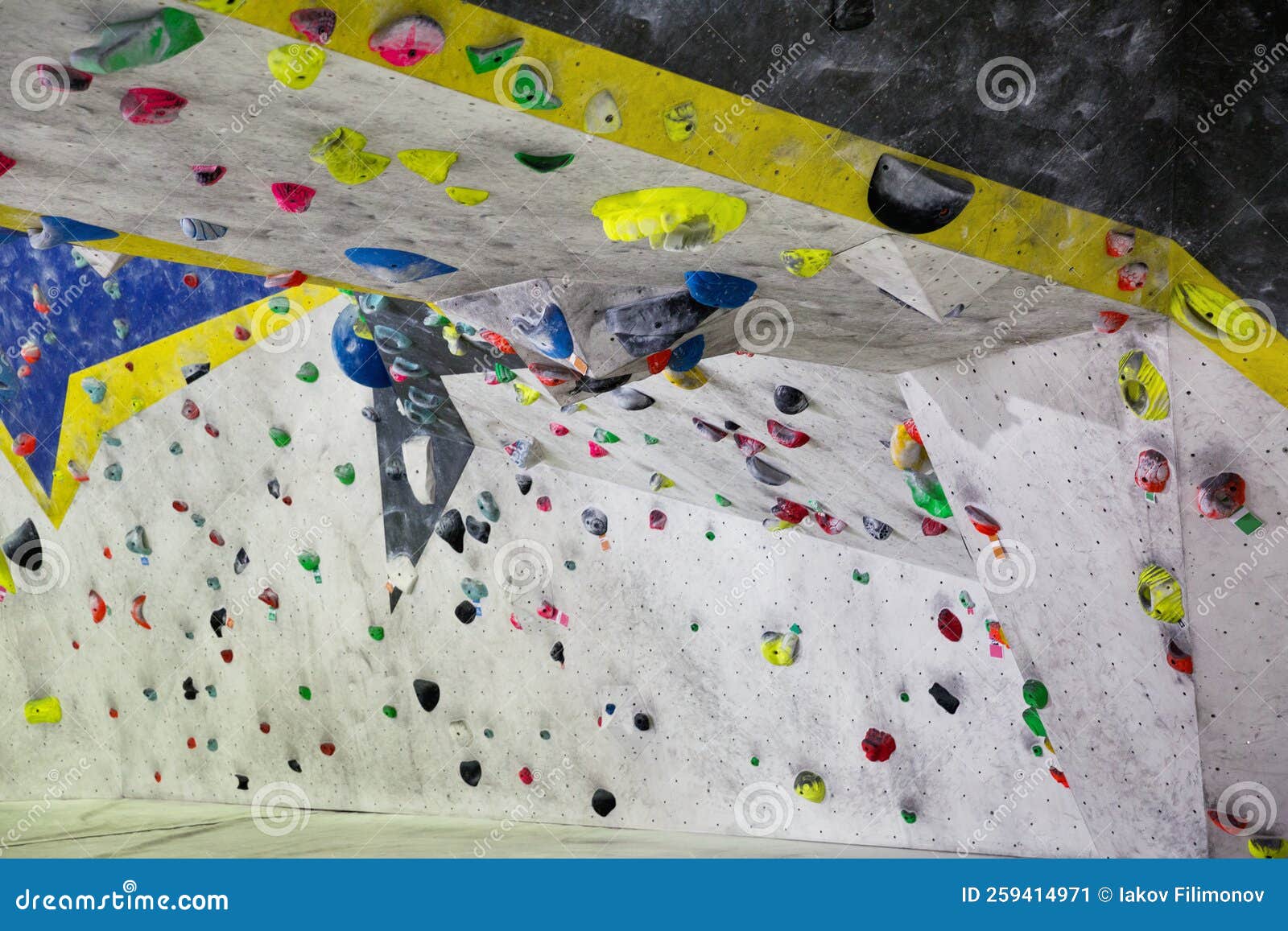 Colored Climbing Wall for Training at Modern Bouldering Gym Stock Image ...