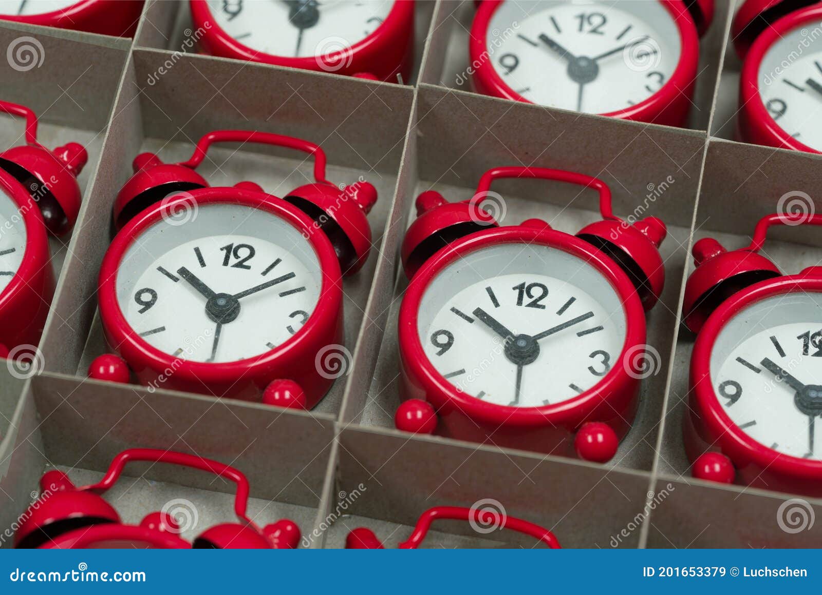 Colored Clock Alarm Clocks in a Cardboard Box Stock Image - Image of ...