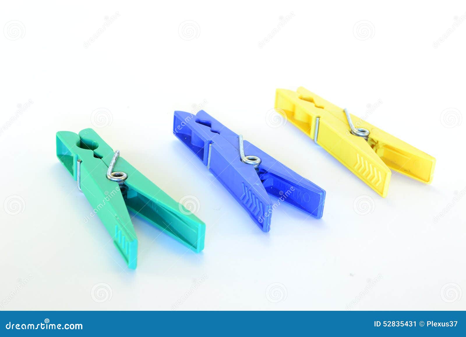 3 colored clothes pegs stock image. Image of color, yellow - 52835431