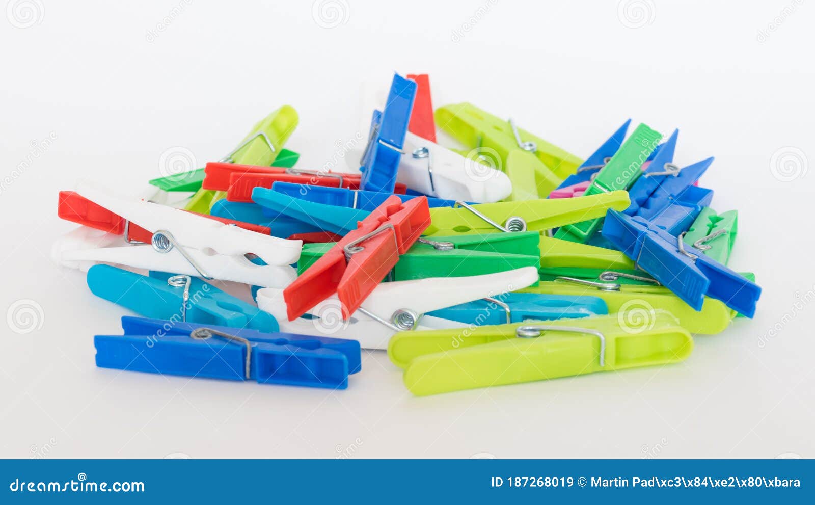 Colored Clothes Pegs on a White Isolated Surfaces Stock Image - Image ...