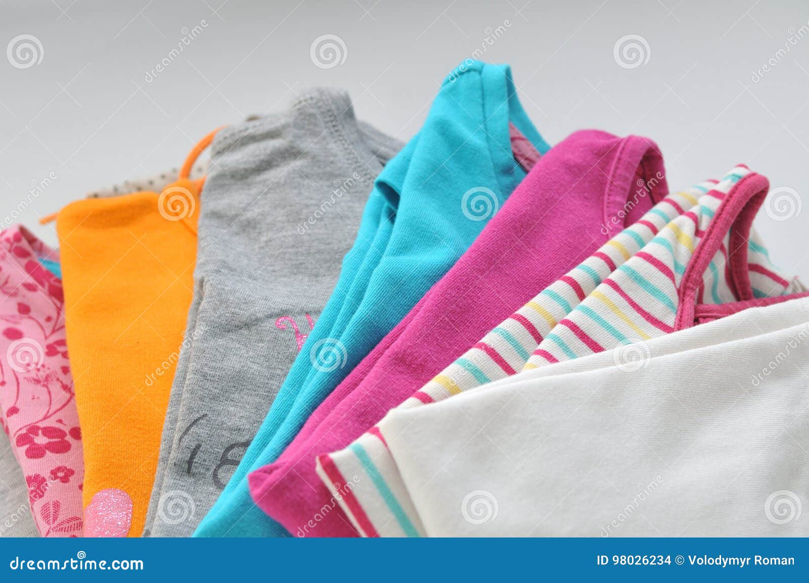 Colored Clothes on a White Background Stock Photo - Image of retail ...