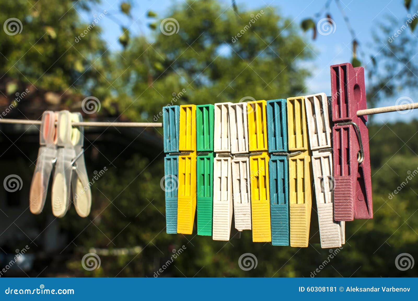 Colored clothesline clips stock image. Image of clip - 60308181