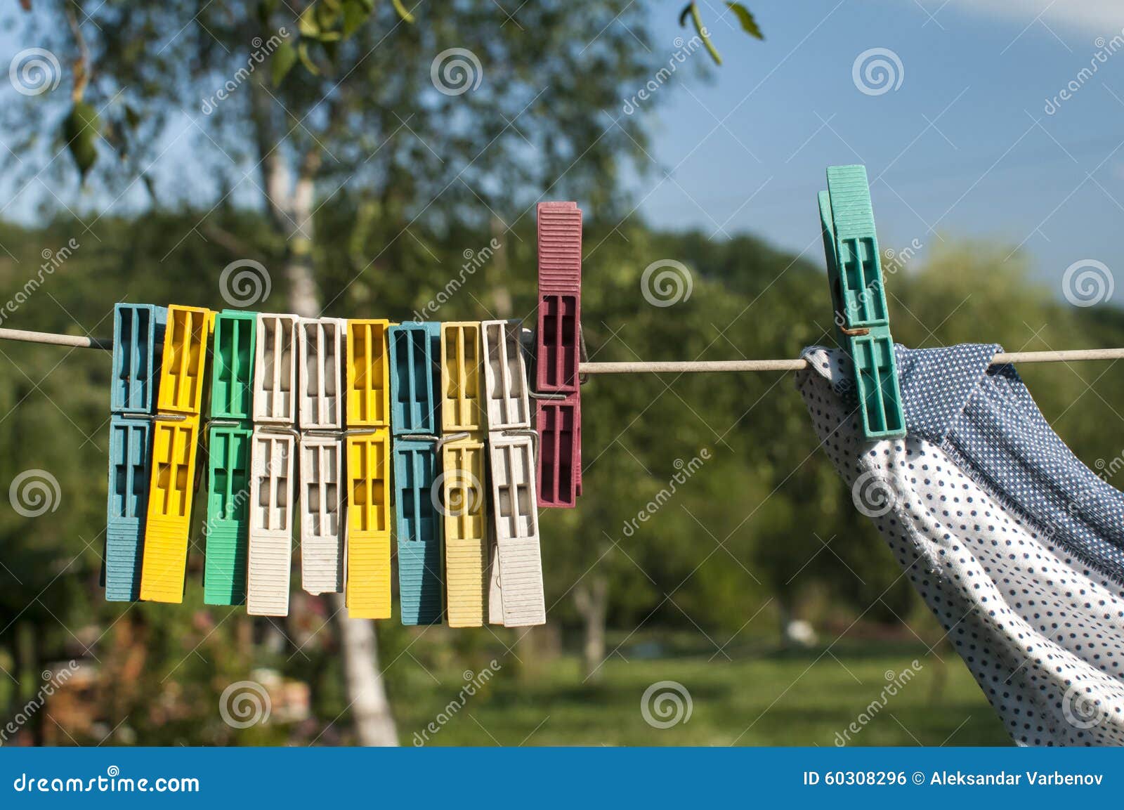 Colored clothesline clips stock photo. Image of household - 60308296