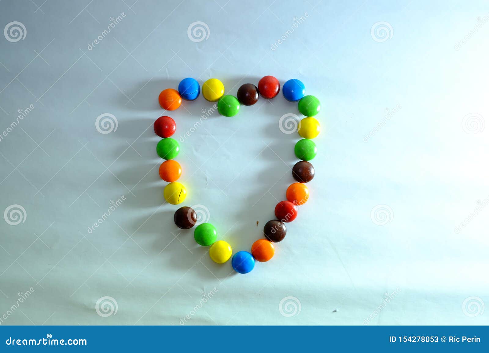 Colored Coated Chocolate Candy Similar To M & Ms on a White Background ...