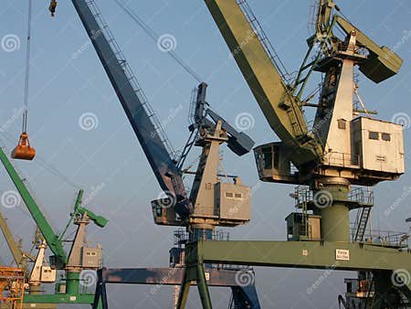 Colored cranes 1 stock image. Image of cranes, crane, dockyard - 95567