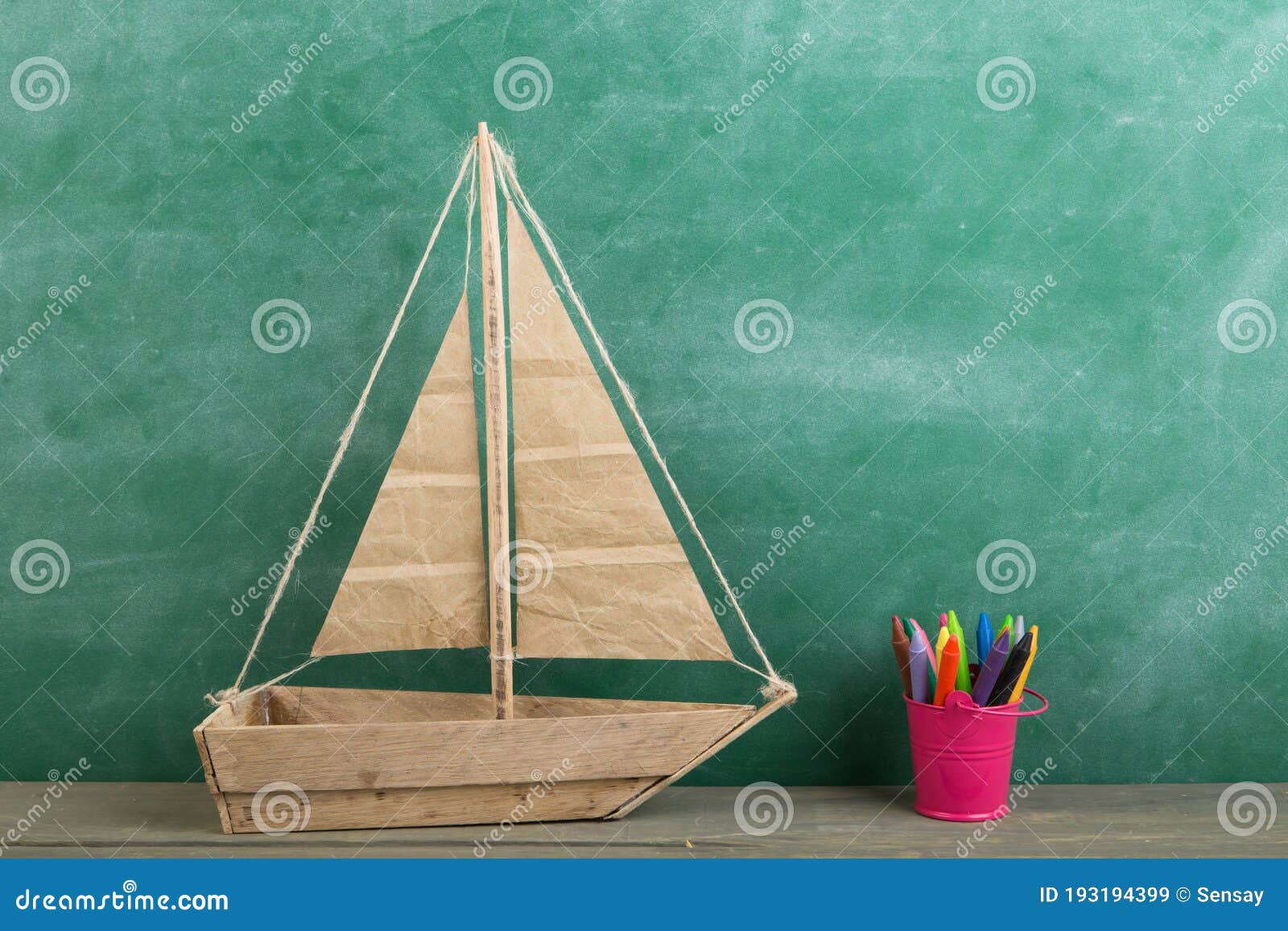 Colored Crayons and Toy Boat on the Wooden Table - Elementary School ...