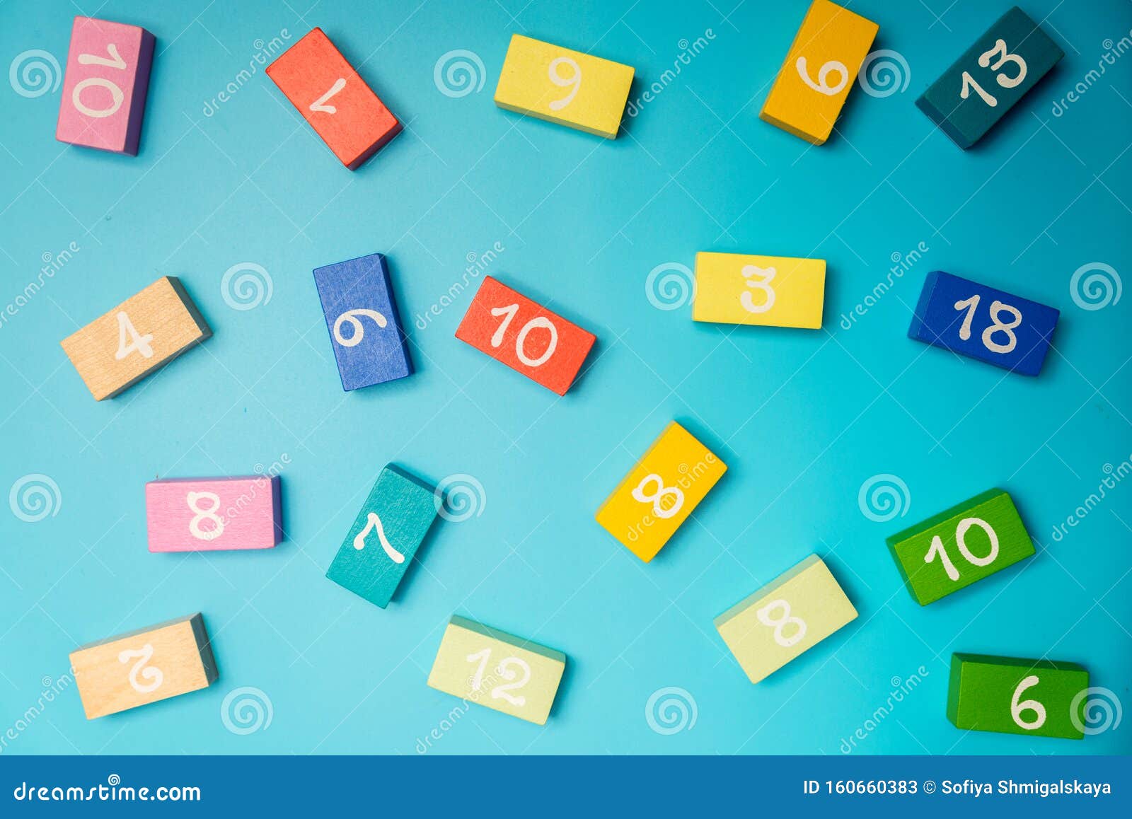 Colored Cubes with Numbers on a Blue Background Stock Image - Image of ...
