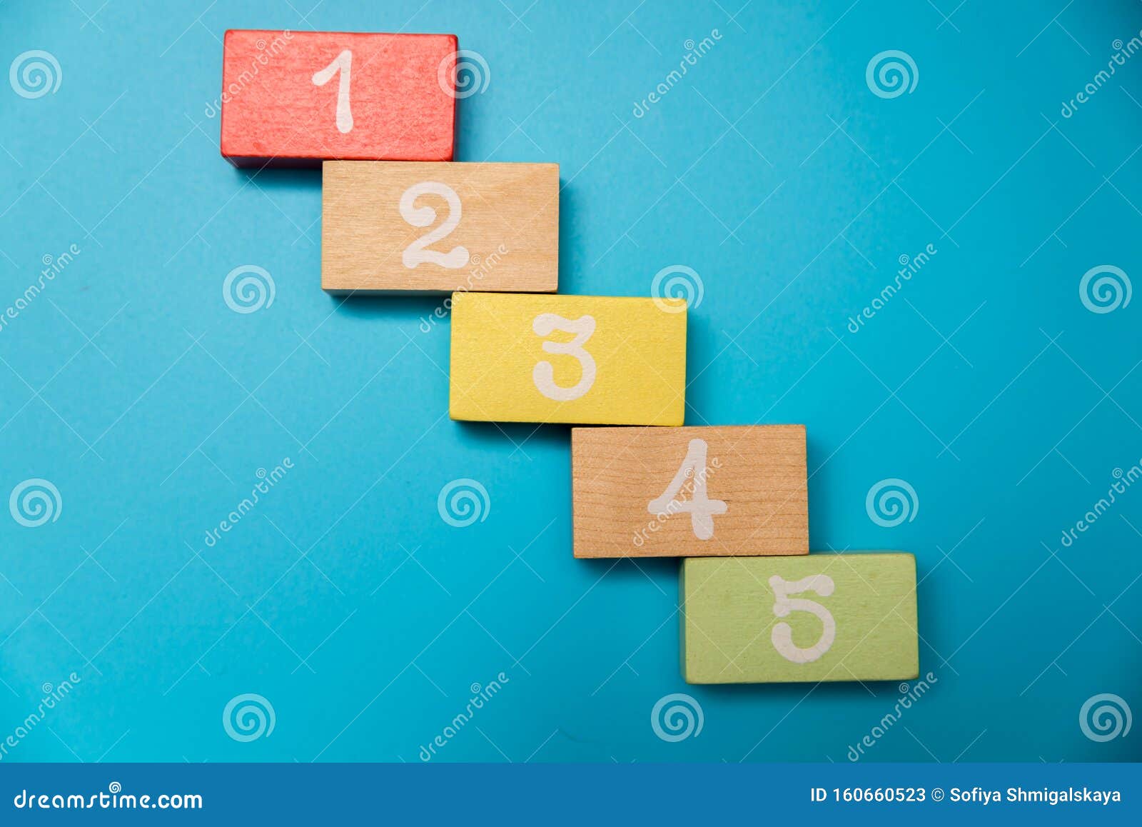 Colored Cubes with Numbers on a Blue Background Stock Image - Image of ...